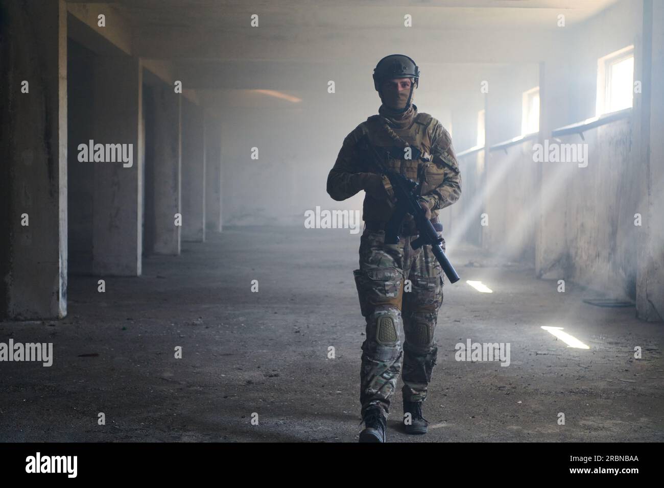 A professional soldier in an abandoned building shows courage and ...