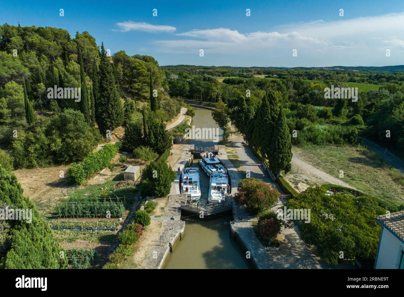 Aerial view of a Le Boat Horizon 5 houseboat and other houseboats in the Écluse de Pechlaurieron ...