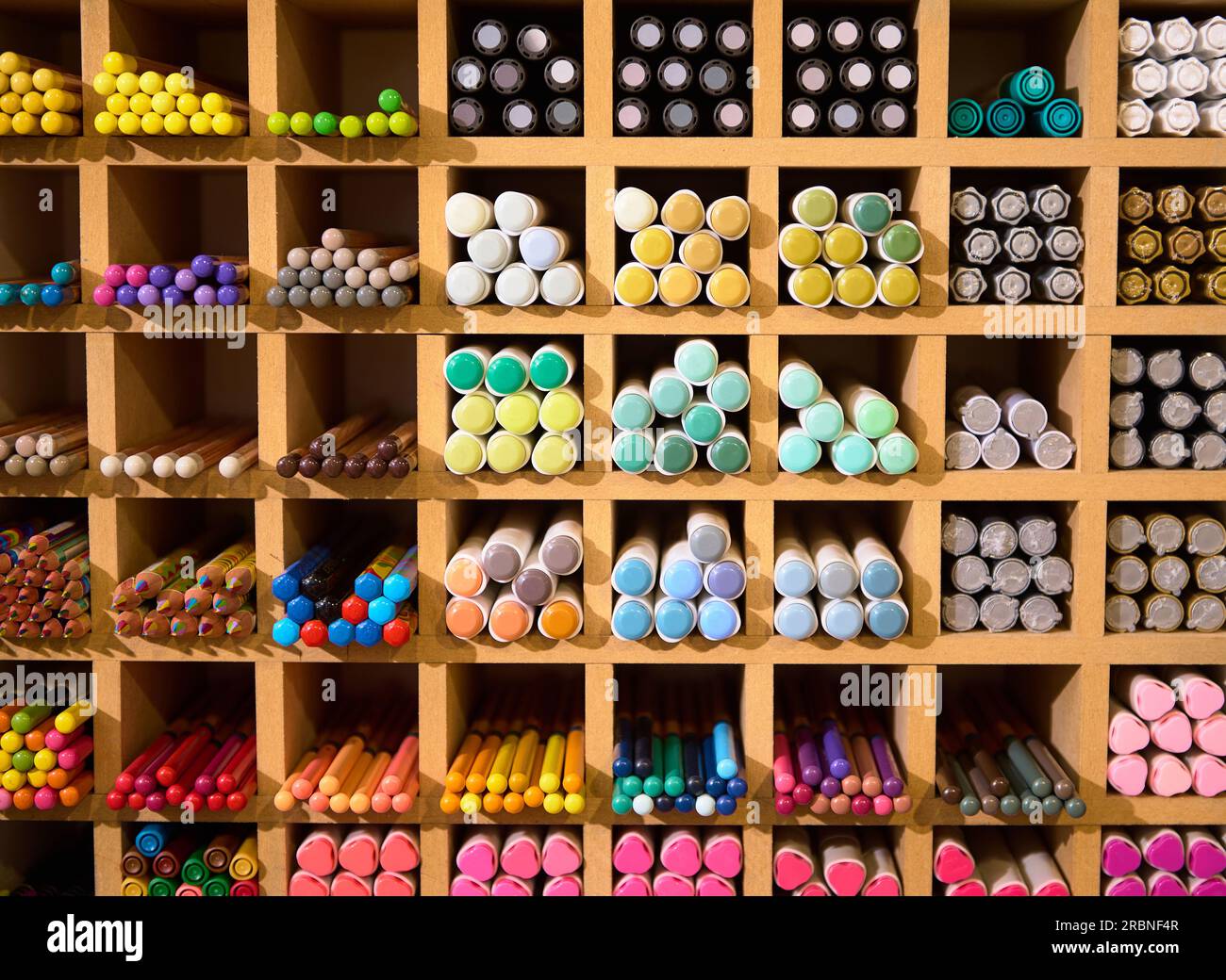 Background of wooden shelf with colorful felt tip pens, markers, color ...