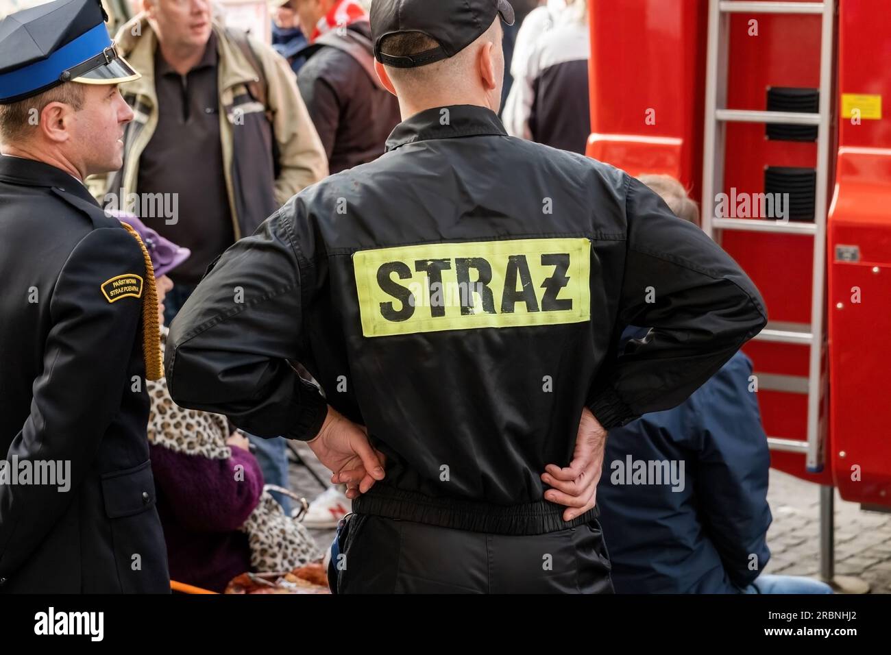 Polish fireman, anonymous firefighter in a uniform back closeup, fire ...