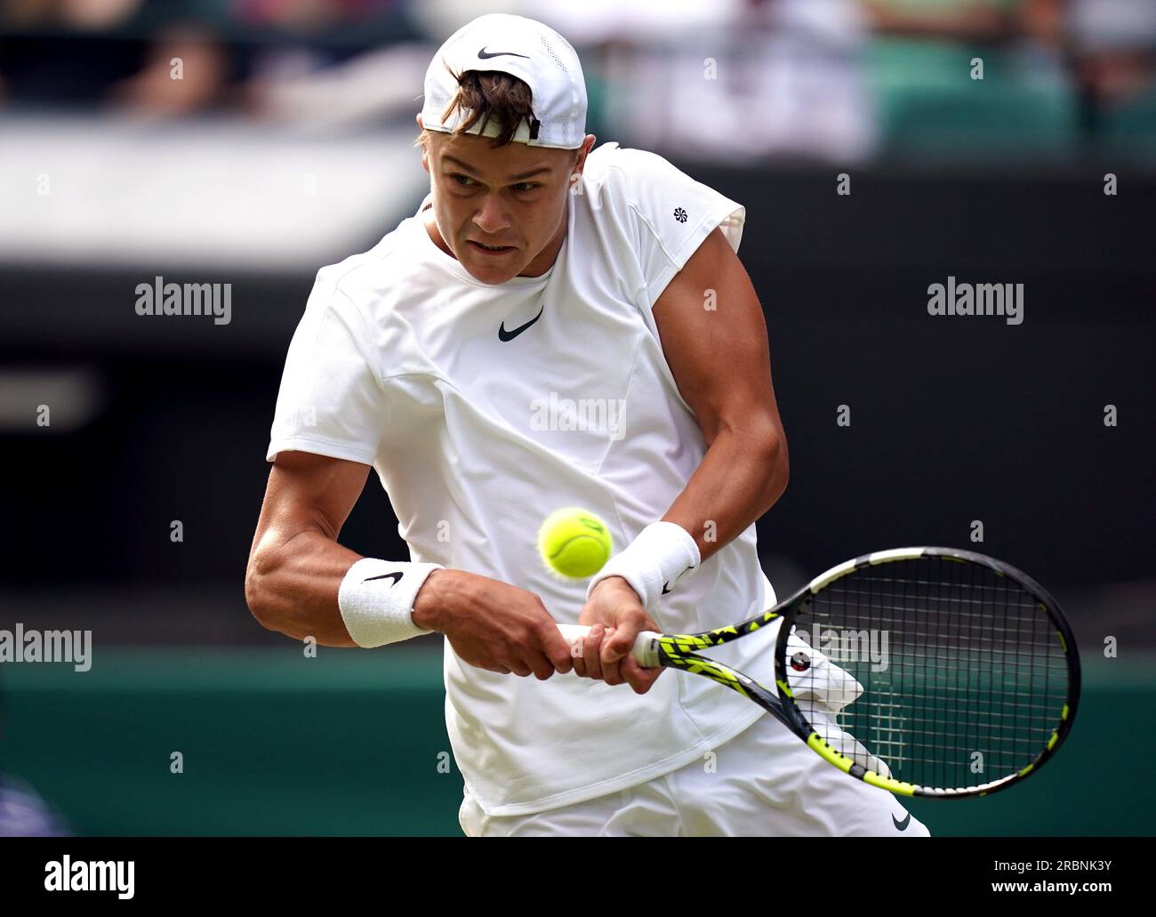 Holger Rune in action against Grigor Dimitrov (not pictured) on day ...