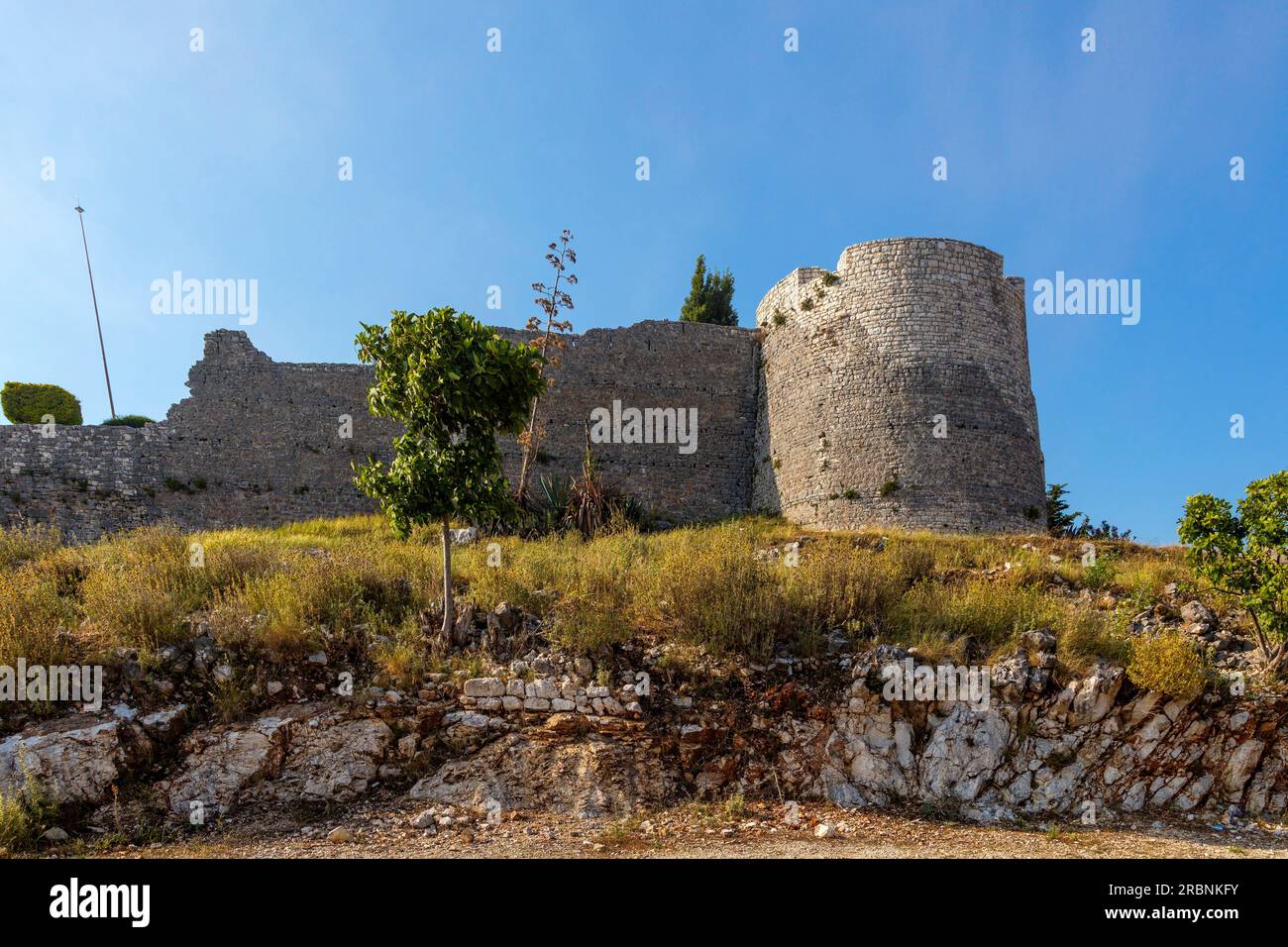 The Lekuresi castle, in the background: Corfu Island, South coast ...
