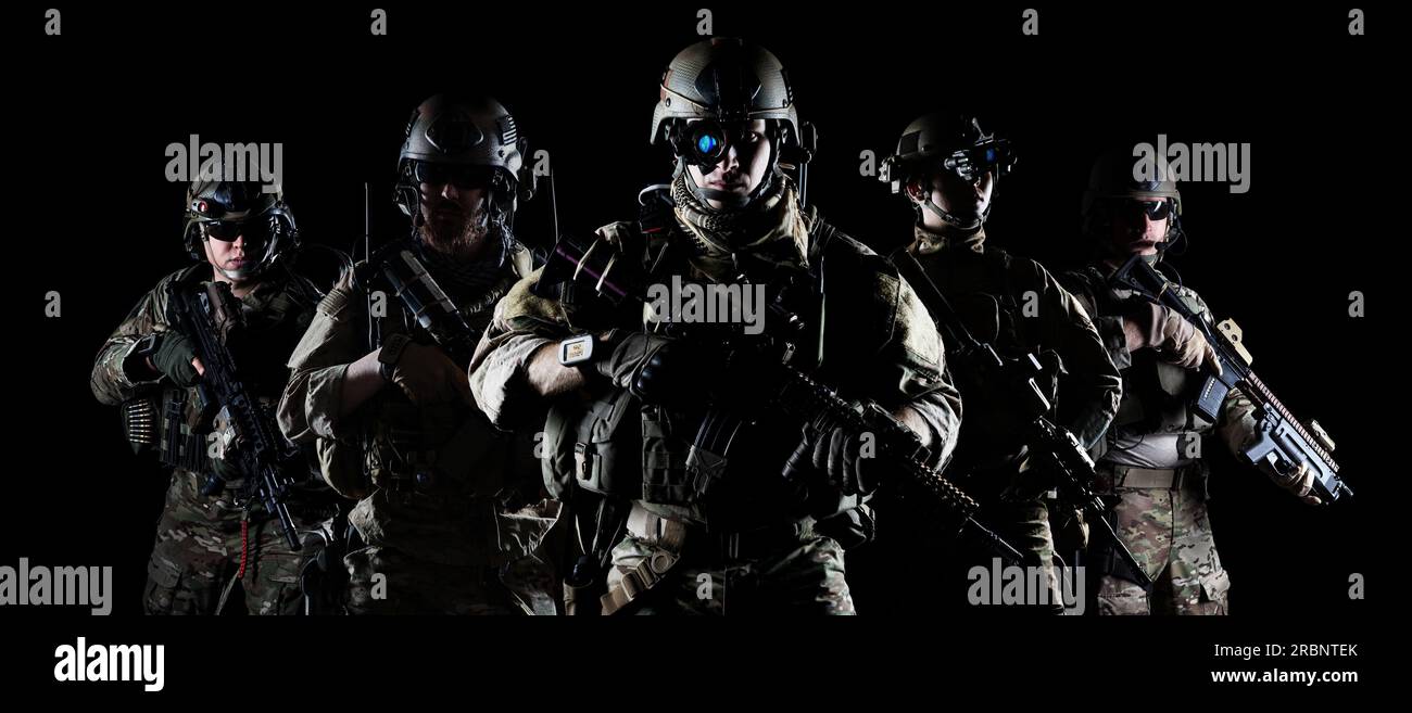 United States Army rangers with assault rifle on dark background Stock ...