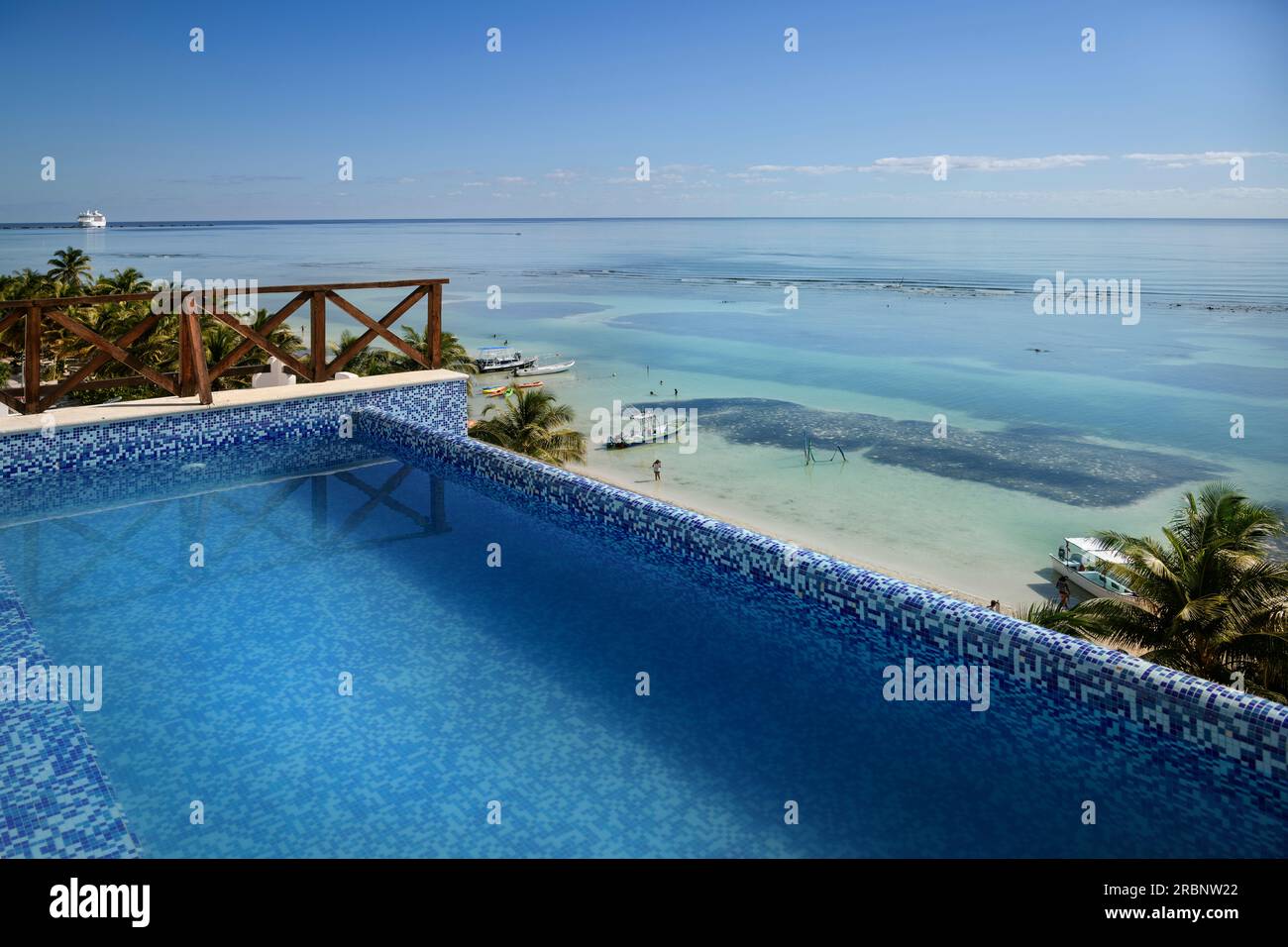 View over the infinity pool to the dreamy beach of Mahahual, Quintana ...