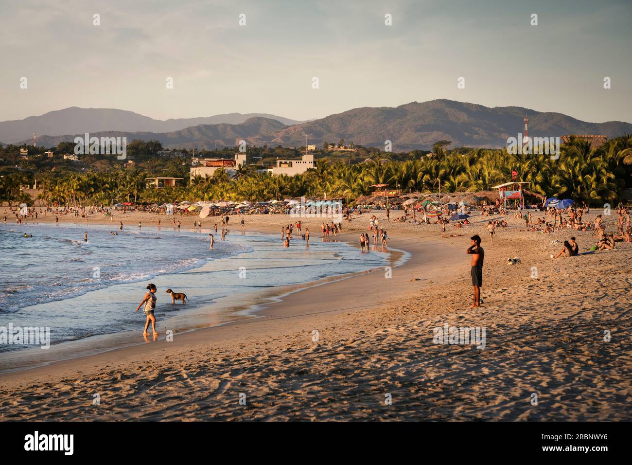People enjoying the sunset at Punta Zicatela, surf spot at Playa ...