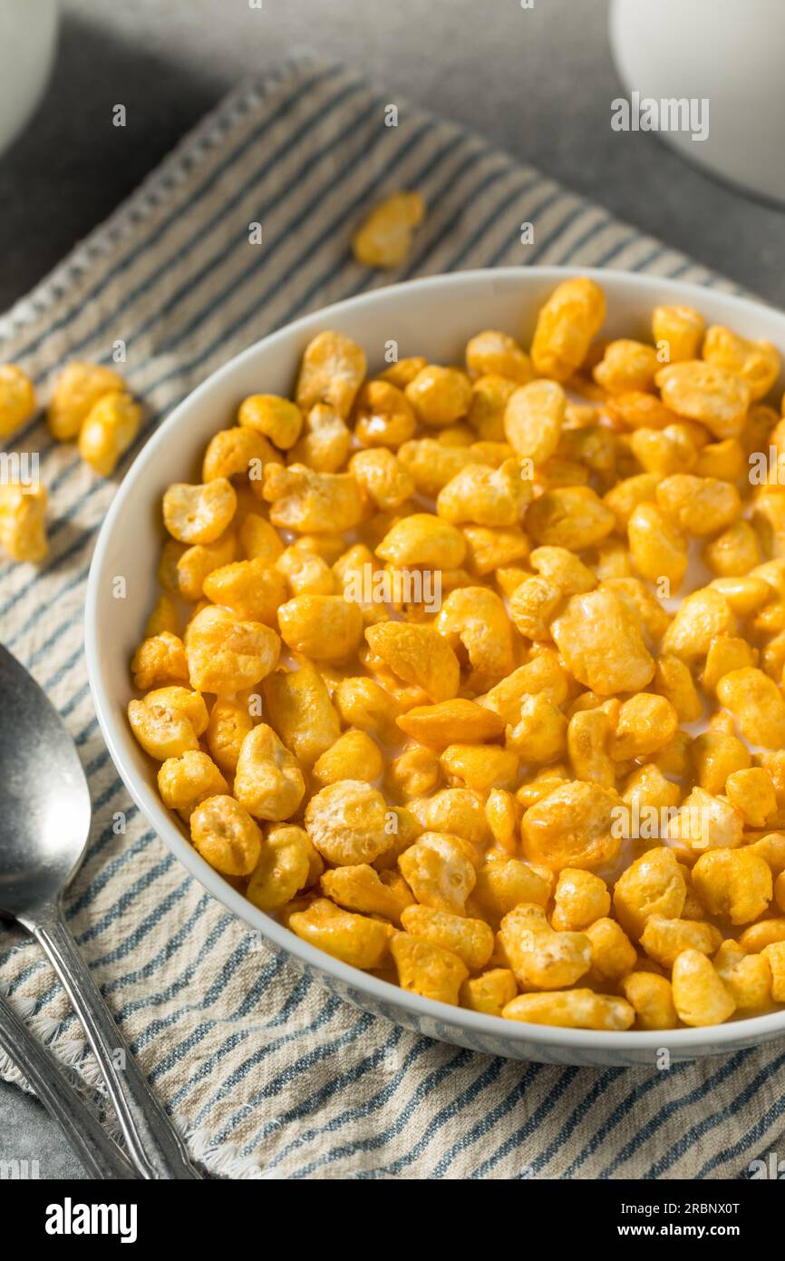 Sweet Sugar Puffed Corn Cereal for Breakfast in a Bowl Stock Photo - Alamy