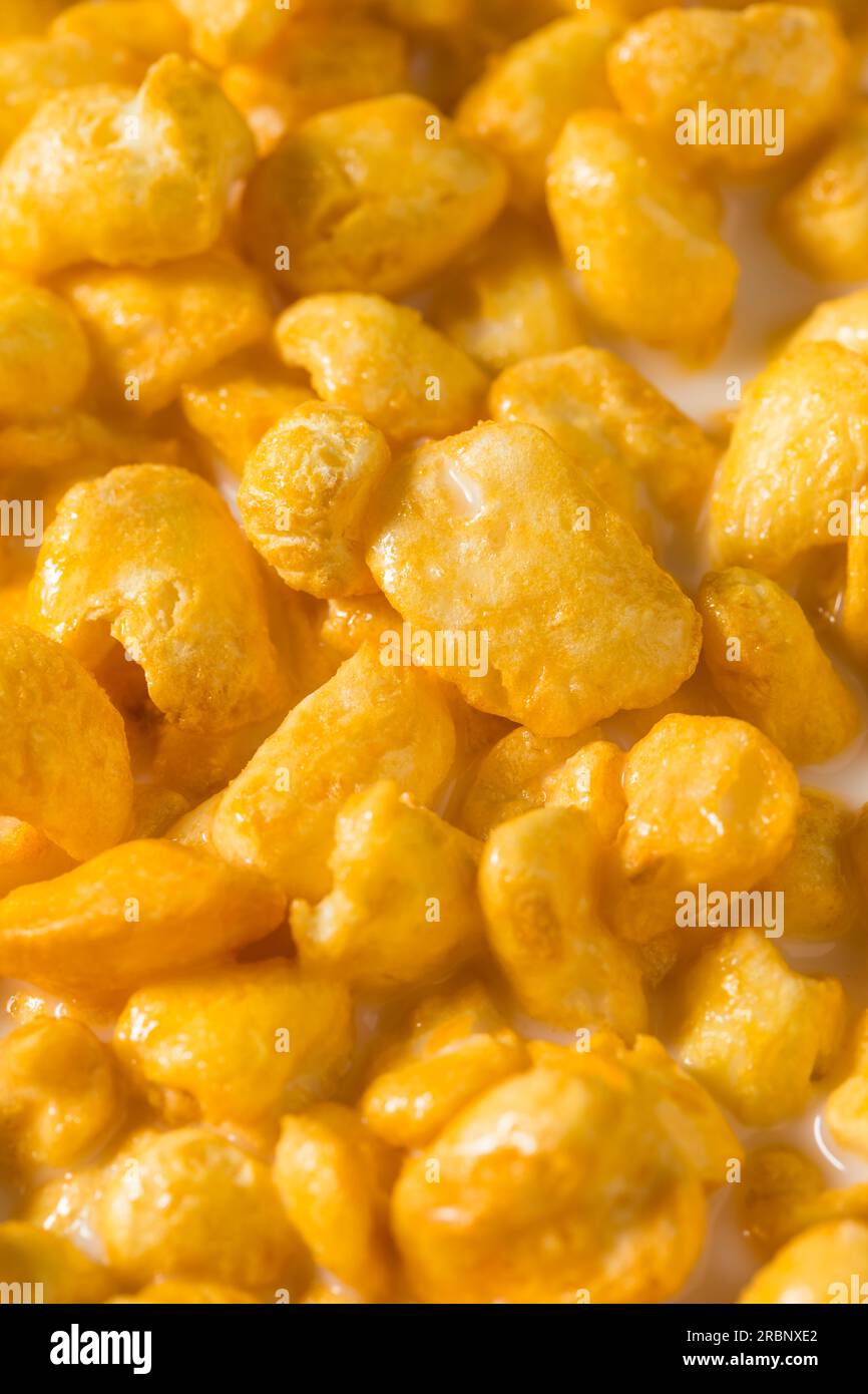 Sweet Sugar Puffed Corn Cereal for Breakfast in a Bowl Stock Photo - Alamy