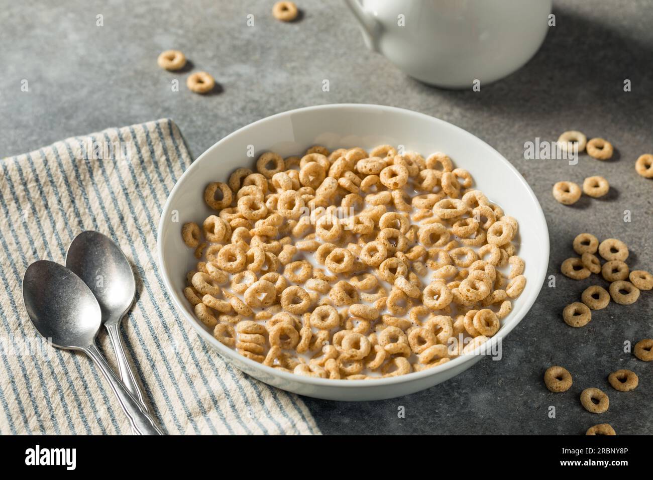 Healthy Oat Breakfast Cereal Rings with Whole Milk Stock Photo - Alamy
