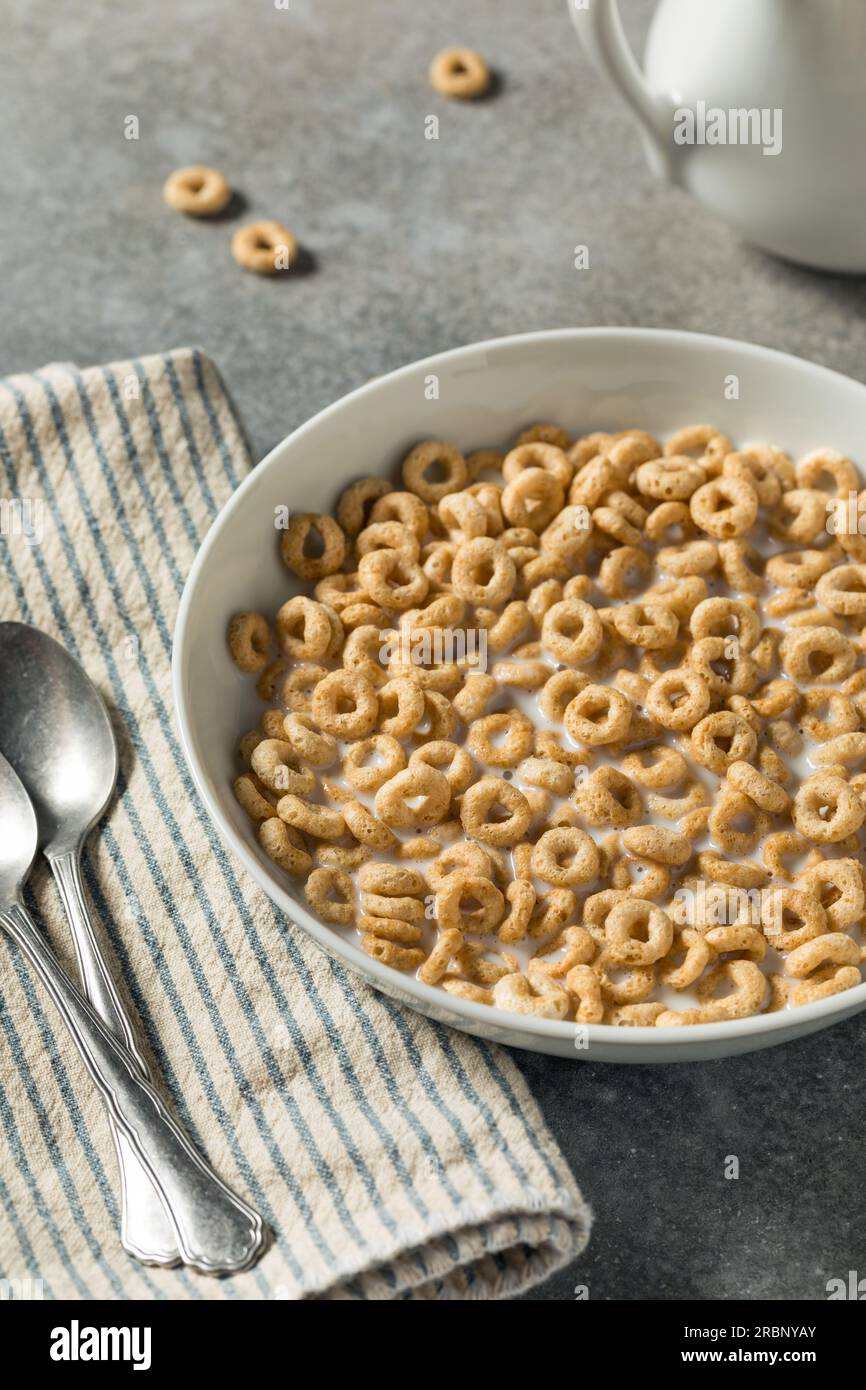 Healthy Oat Breakfast Cereal Rings with Whole Milk Stock Photo - Alamy