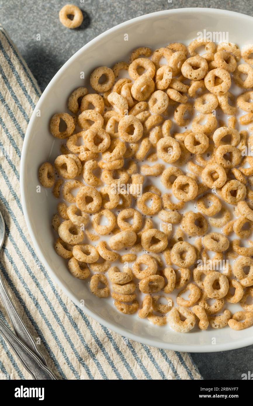 Healthy Oat Breakfast Cereal Rings with Whole Milk Stock Photo - Alamy
