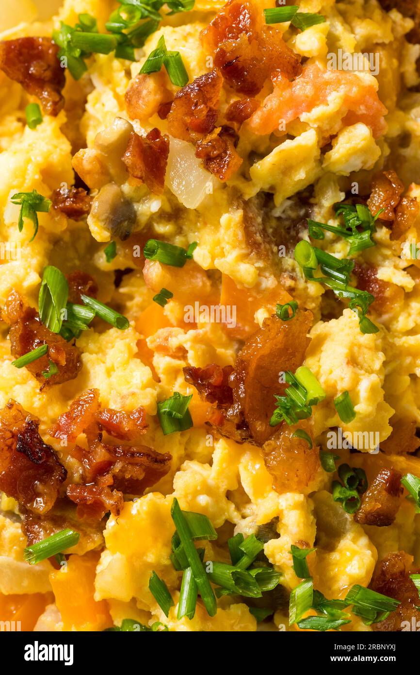 Homemade Bacon Egg Scramble with Peppers and Toast Stock Photo - Alamy