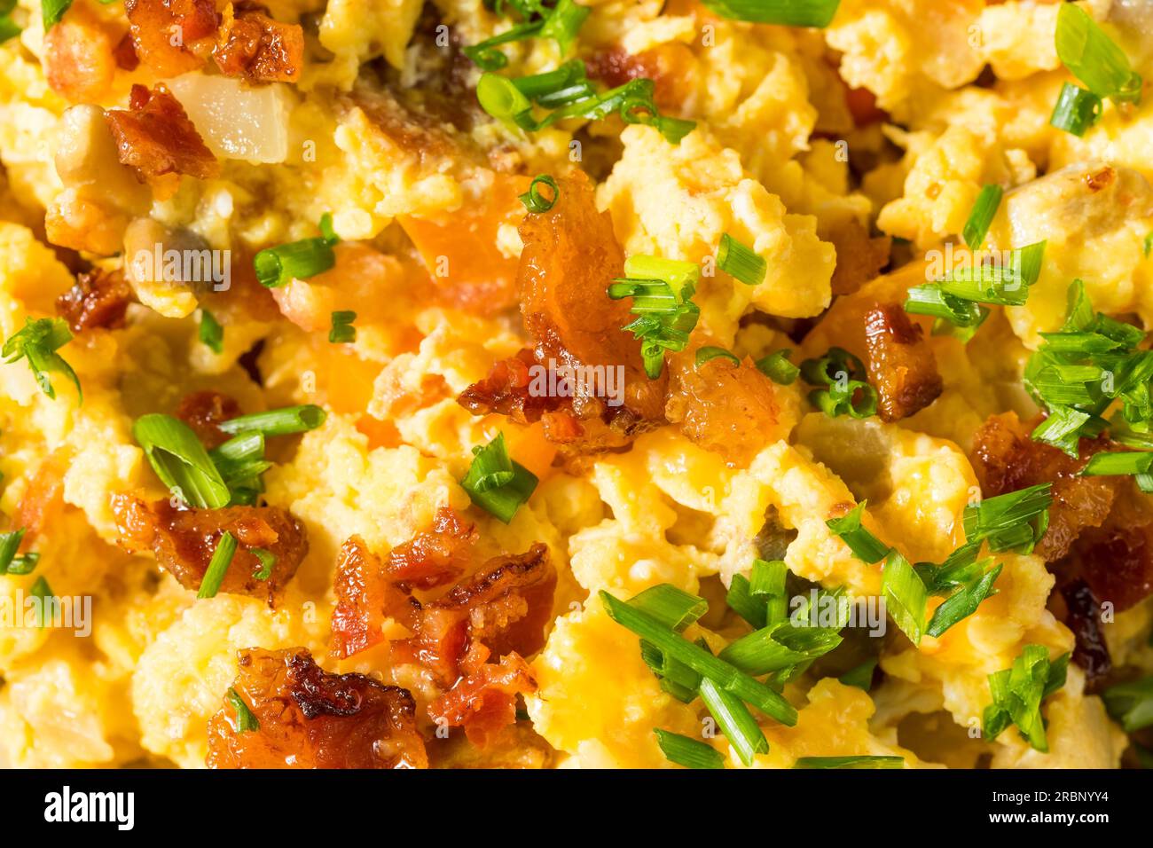 Homemade Bacon Egg Scramble with Peppers and Toast Stock Photo - Alamy