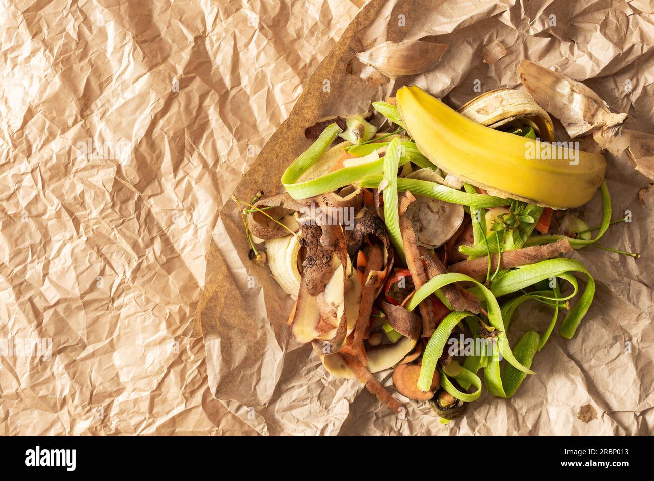 Food organic waste on eco friendly parchment paper, fruit and vegetable ...