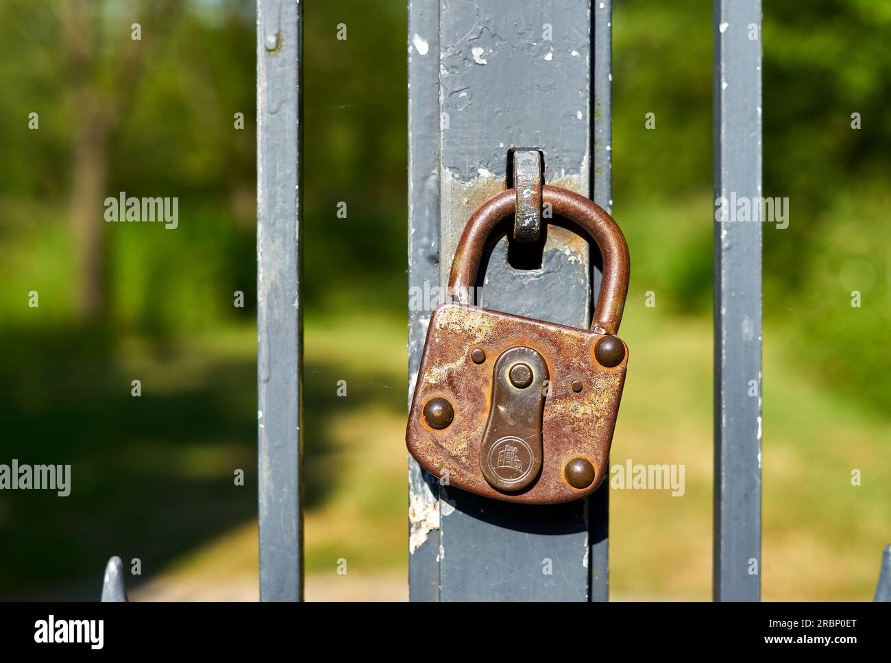 Wrought iron gate lock hi-res stock photography and images - Alamy