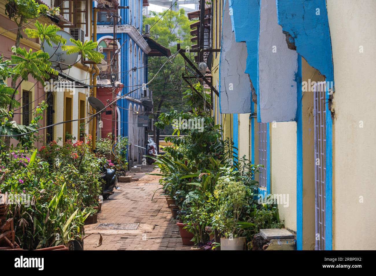Goa, India -- April 10, 2023. Colorful Homes on a side street in Goa ...