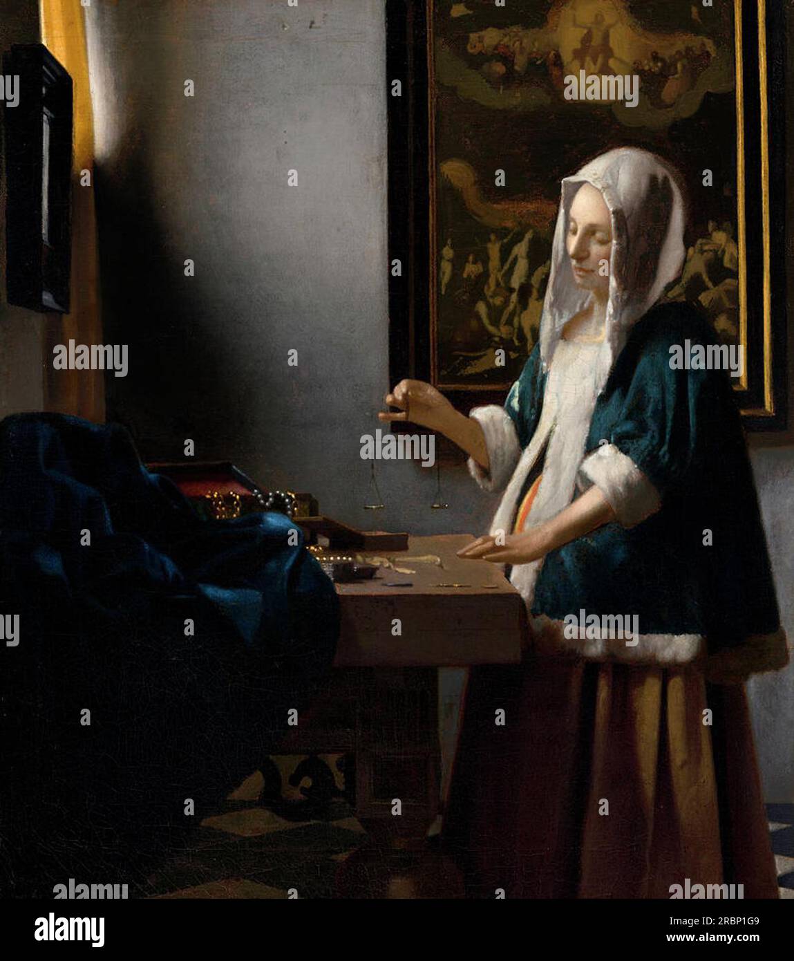 Woman holding a balance vermeer hi-res stock photography and images - Alamy