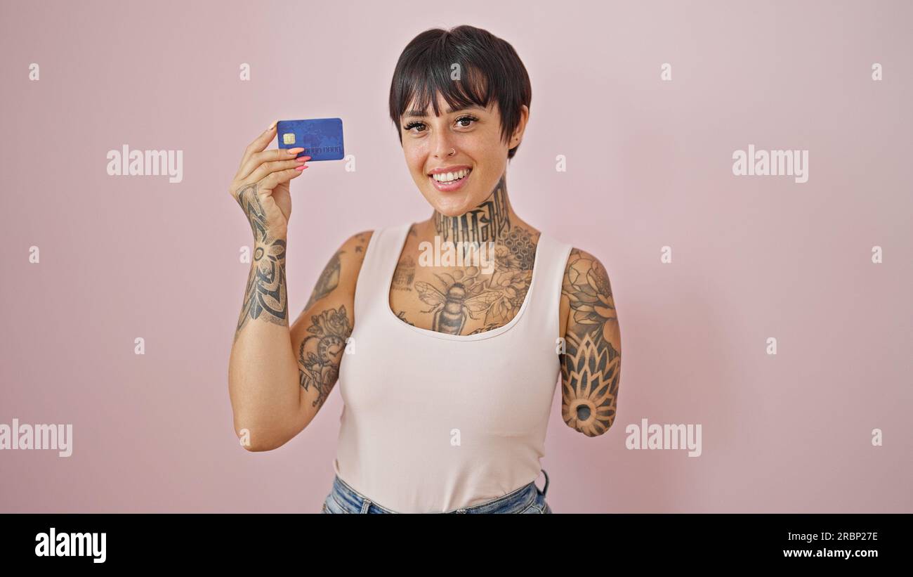 Hispanic woman with amputee arm smiling confident holding credit card ...