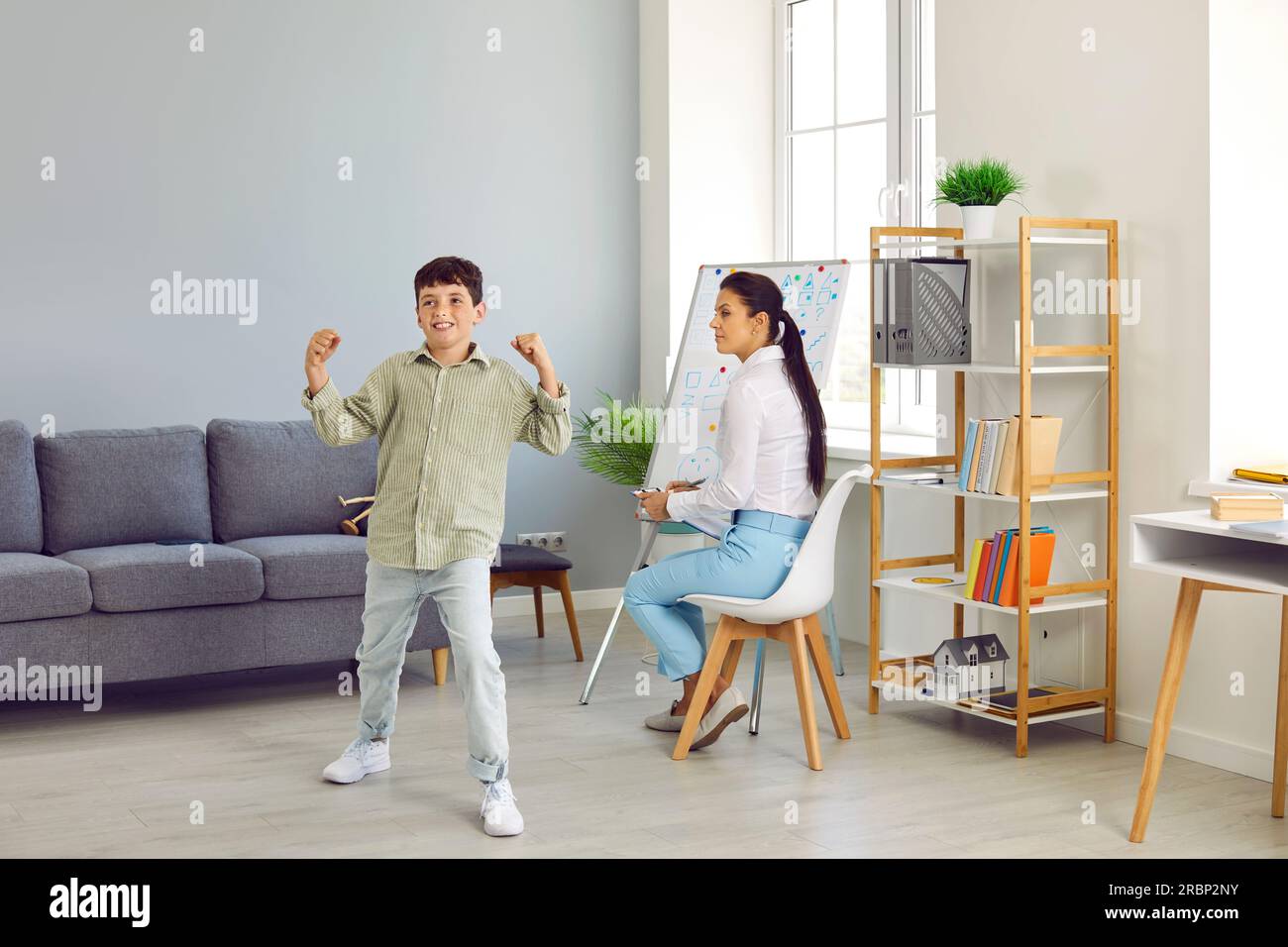 Hyperactive ADHD child or bully boy at therapist's or school ...