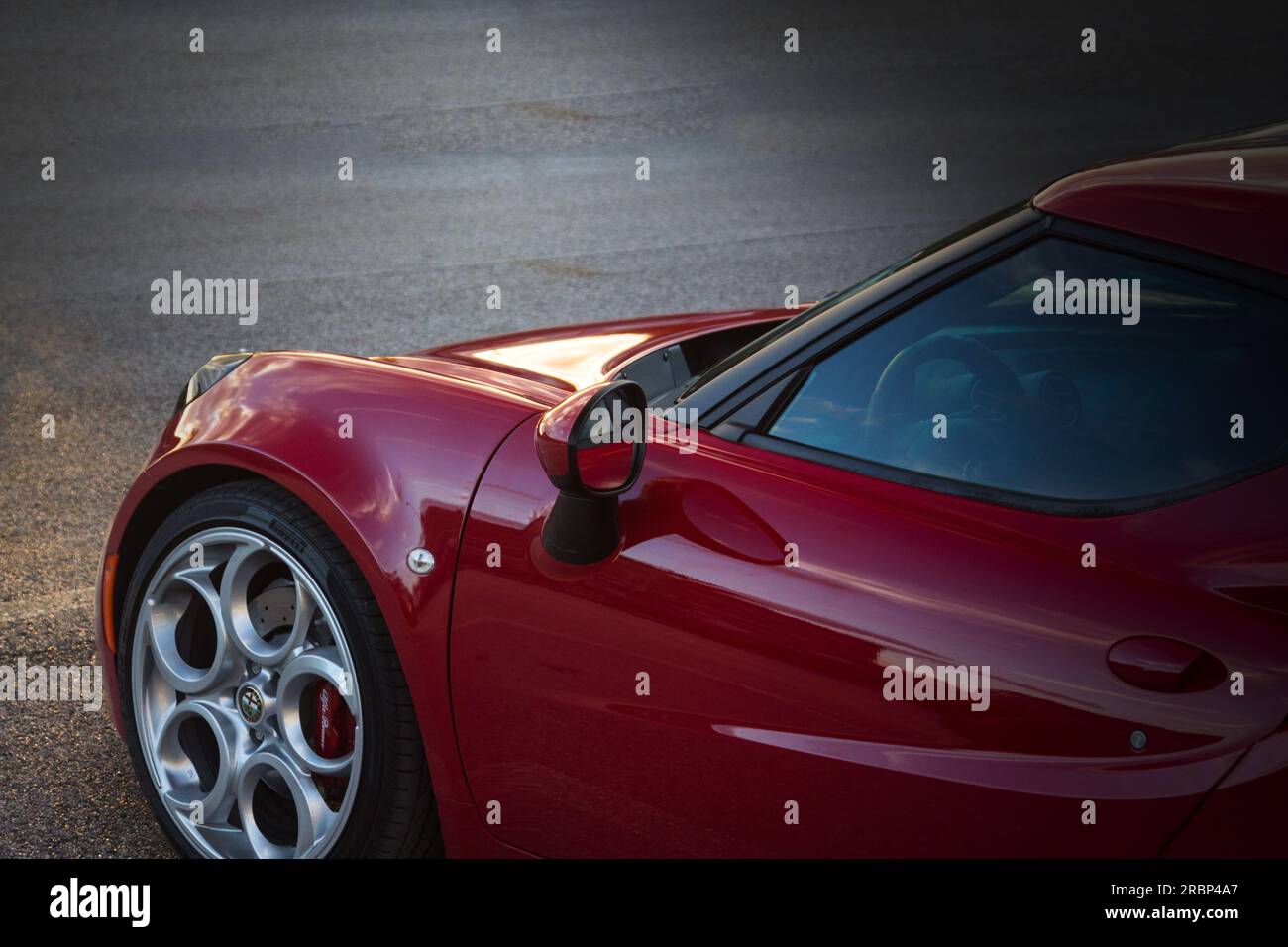 A red 4C Alfa Romeo sports car Stock Photo - Alamy