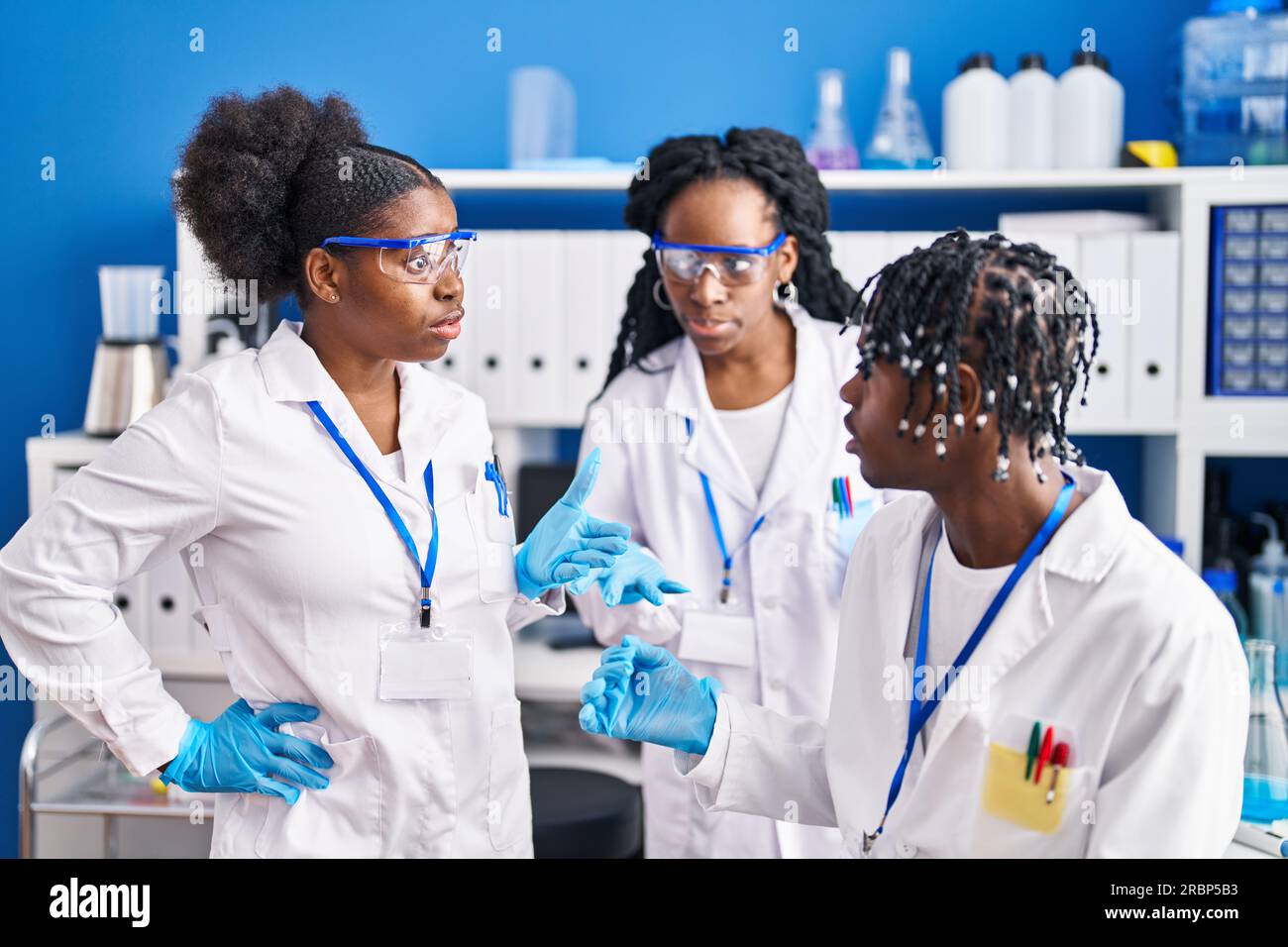 African american friends scientists speaking at laboratory Stock Photo ...