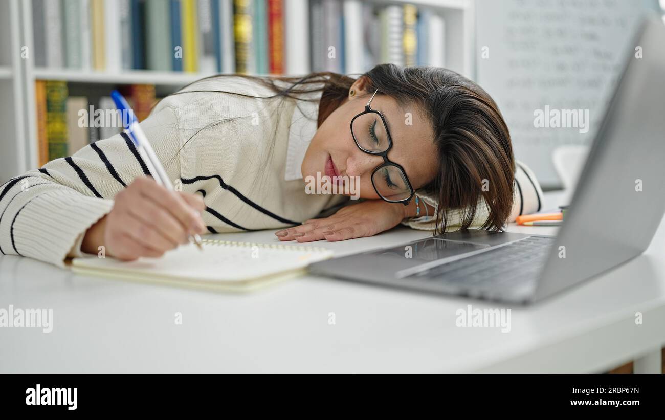Portrait young woman sleeping book head hi-res stock photography and ...