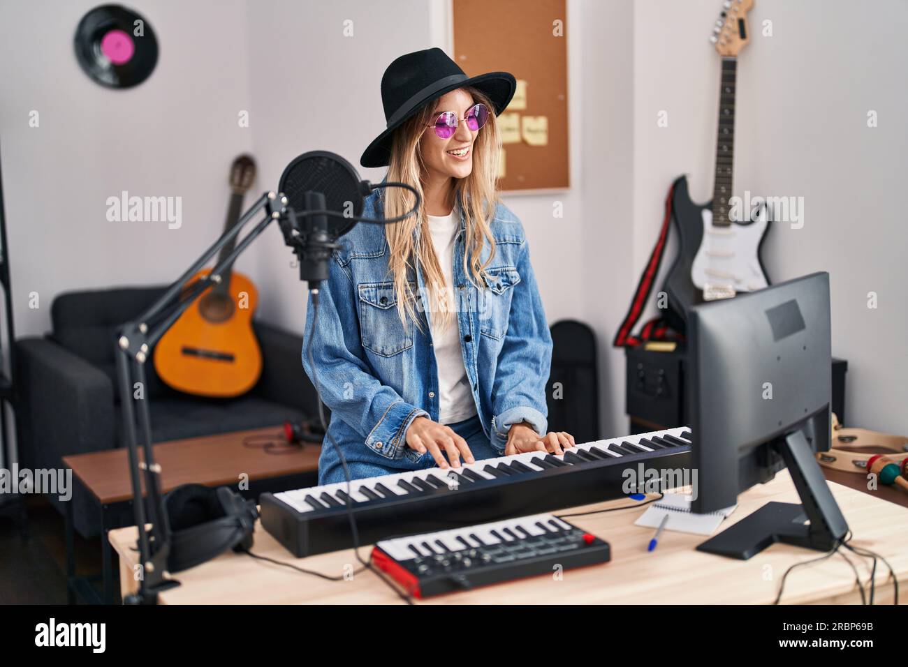 Young blonde musician keyboard hi-res stock photography and images - Alamy