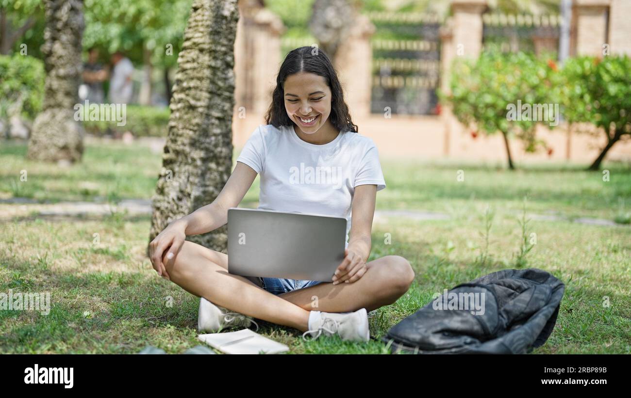 African american woman student using laptop having video call at ...