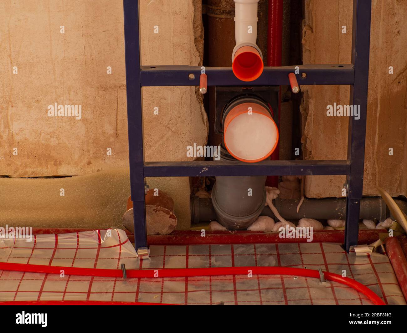installing concealed toilet frame in bathroom Stock Photo - Alamy