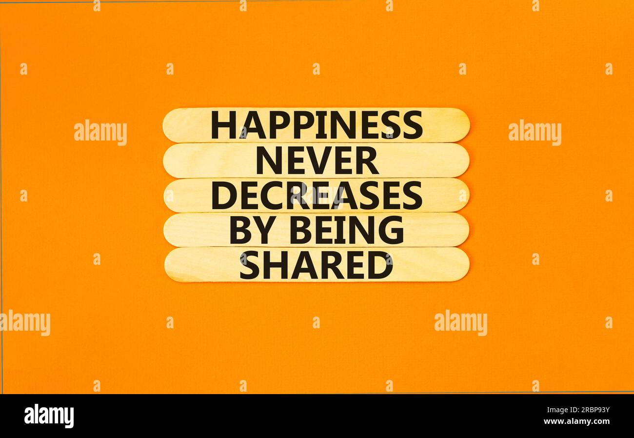 Happiness symbol. Concept words Happiness never decreases by being shared on wooden stick ...