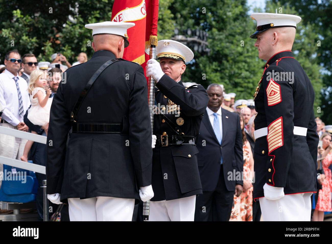 U.S. Marine Corps Gen. David Berger, left, hands the battle colors to ...