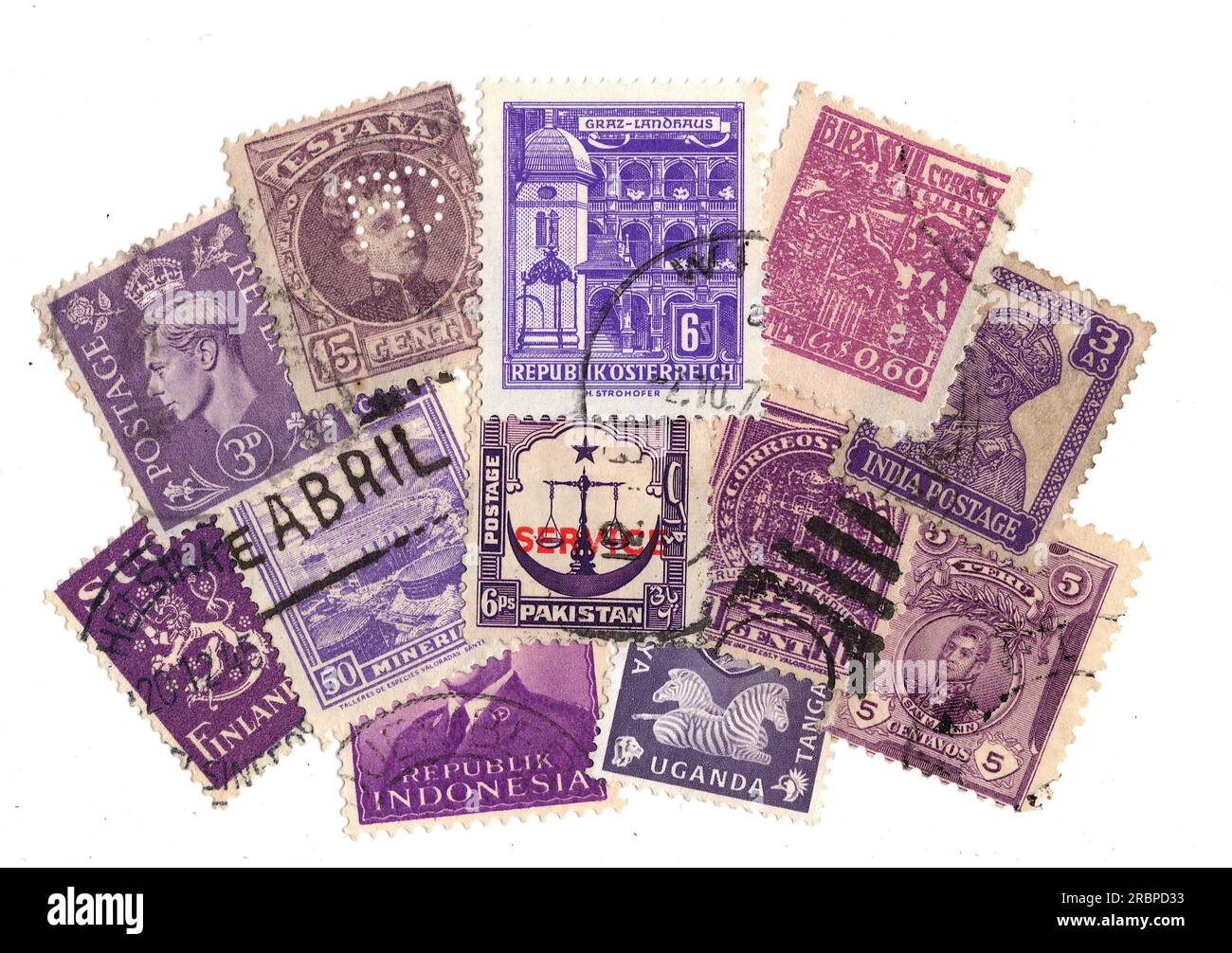 Purple vintage postage stamps from around the world on a white ...