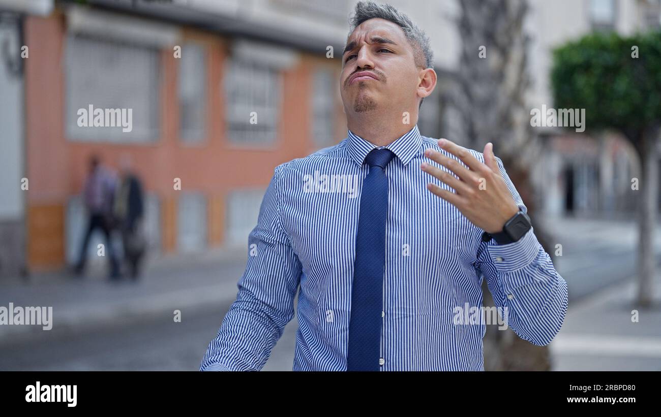 Business suit sweat hi-res stock photography and images - Alamy