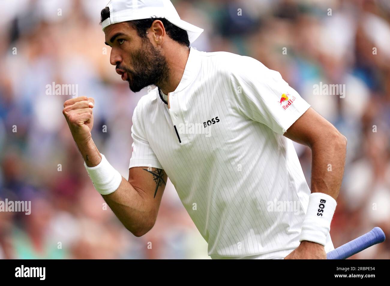 Matteo Berrettini reacts during his match against Carlos Alcaraz (not pictured) on day eight of ...