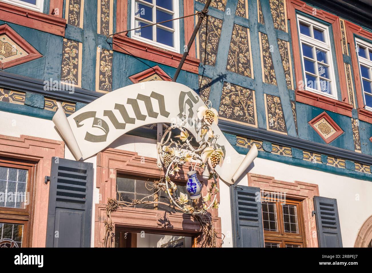 Historic half-timbered houses in the wine village of Hattenheim ...