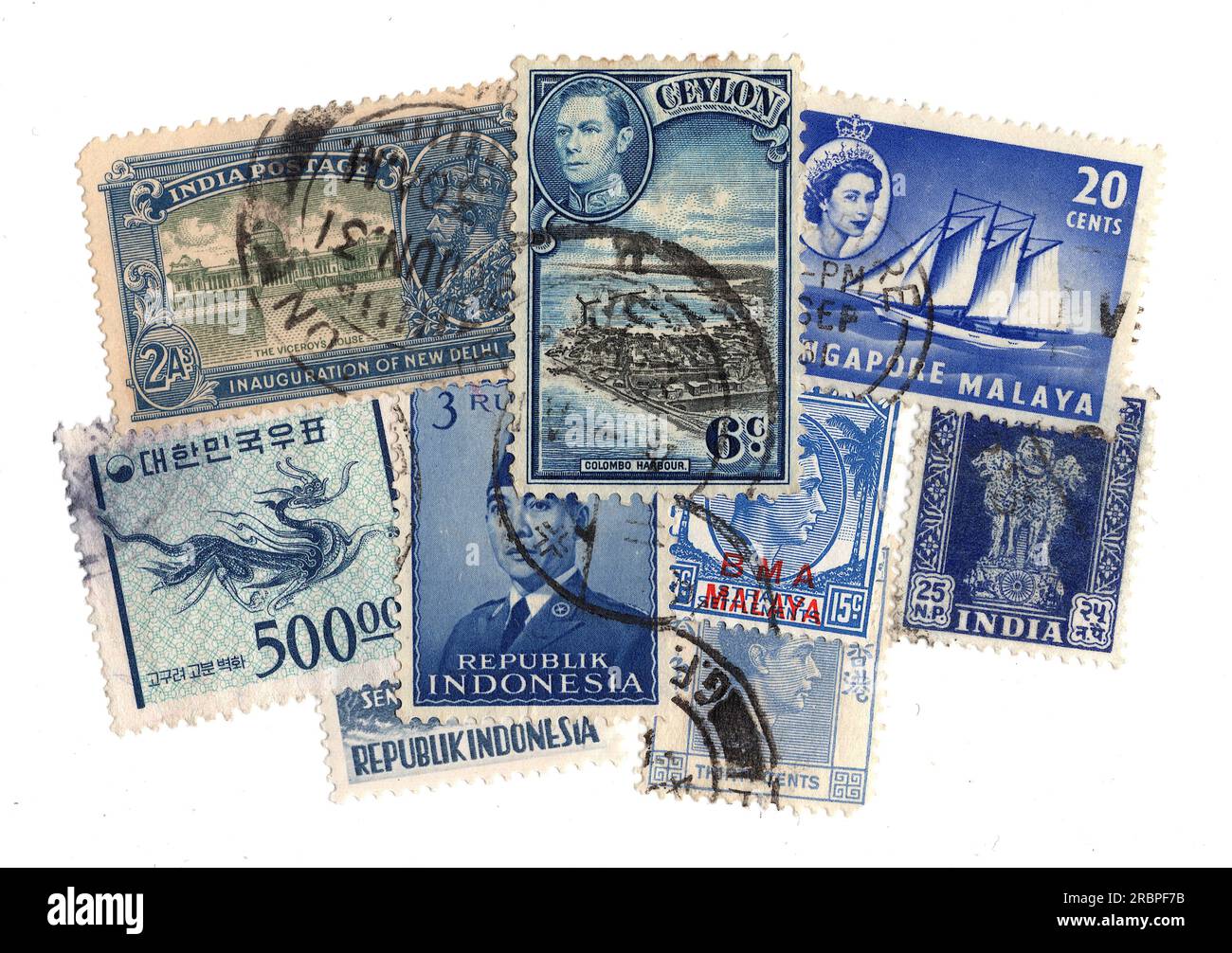 Blue vintage postage stamps from around the world on a white background ...
