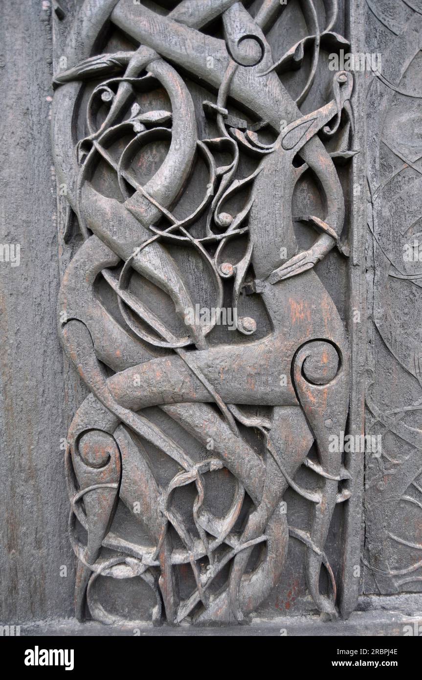 Carving on the Urnes Stave Church 1100 by Viking art Stock Photo - Alamy