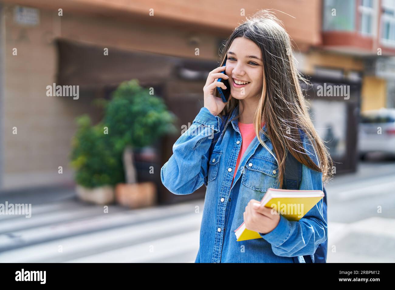 Adorable girl smiling confident talking hi-res stock photography and ...