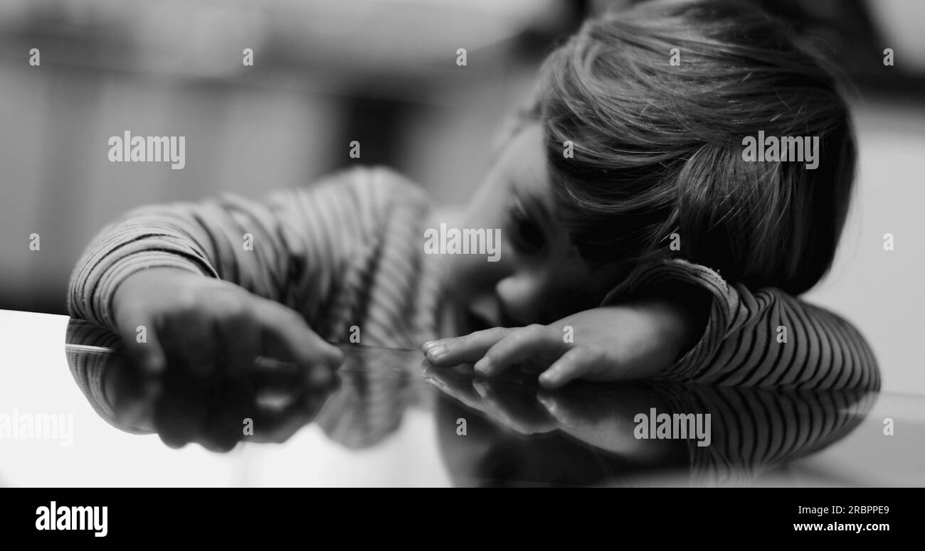 Depressed child covering face trauma concept in monochrome Stock Photo ...