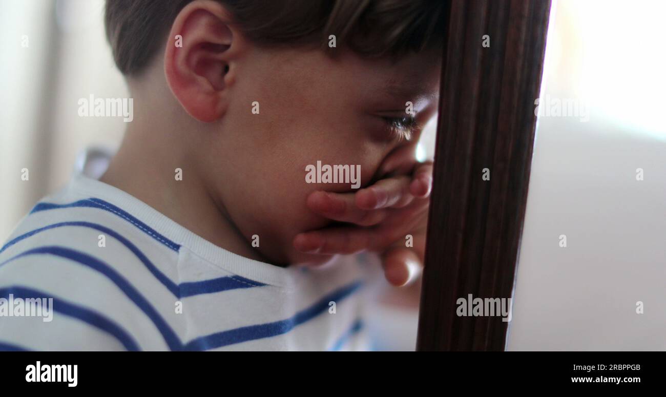 Child crying tearful kid wiping tears feeling upset grounded boy Stock ...