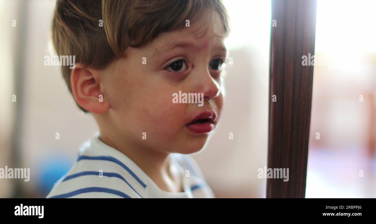 Child crying tearful kid wiping tears feeling upset grounded boy Stock ...