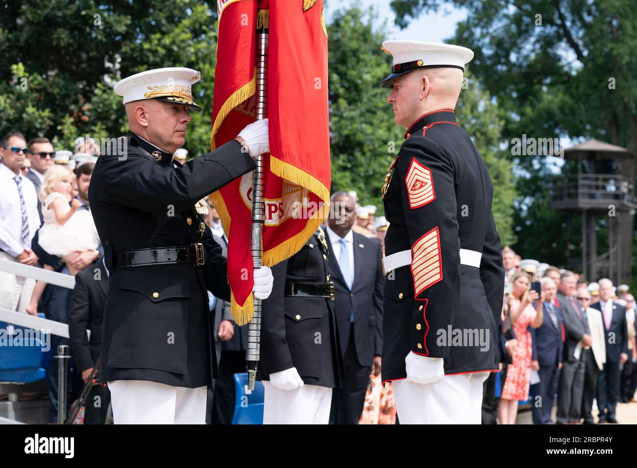 U.S. Marine Corps Gen. David Berger, left, whose term as Commandant of the U.S. Marine Corps ...
