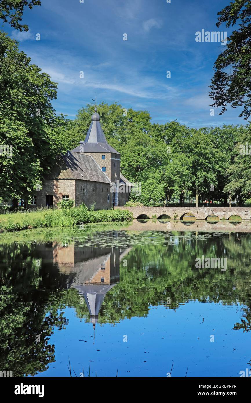 Beautiful medieval dutch castle, green forest, water moat - Arcen ...