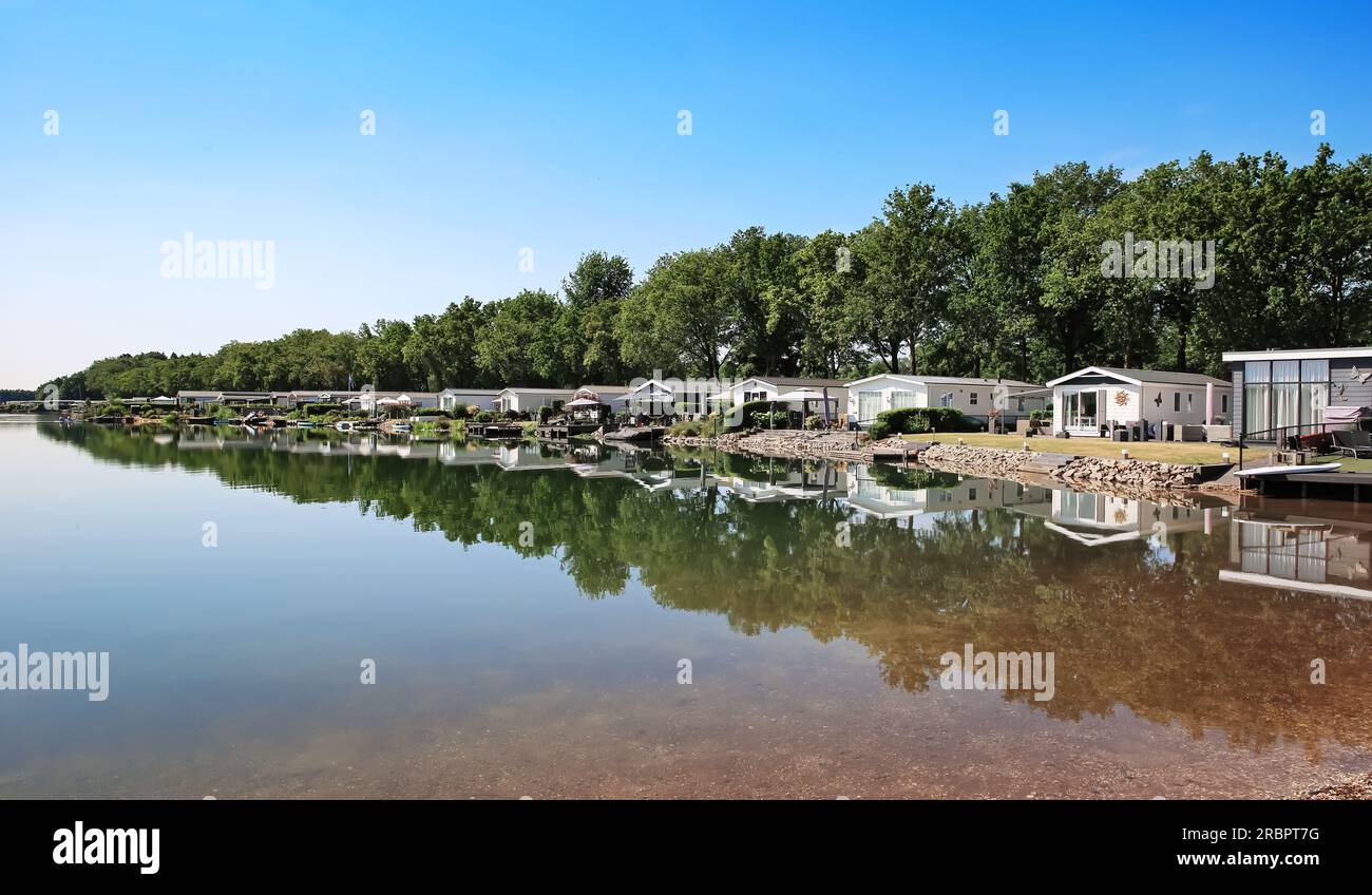 Beautiful lakeside vacation homes at calm idyllic lake in dutch holiday ...