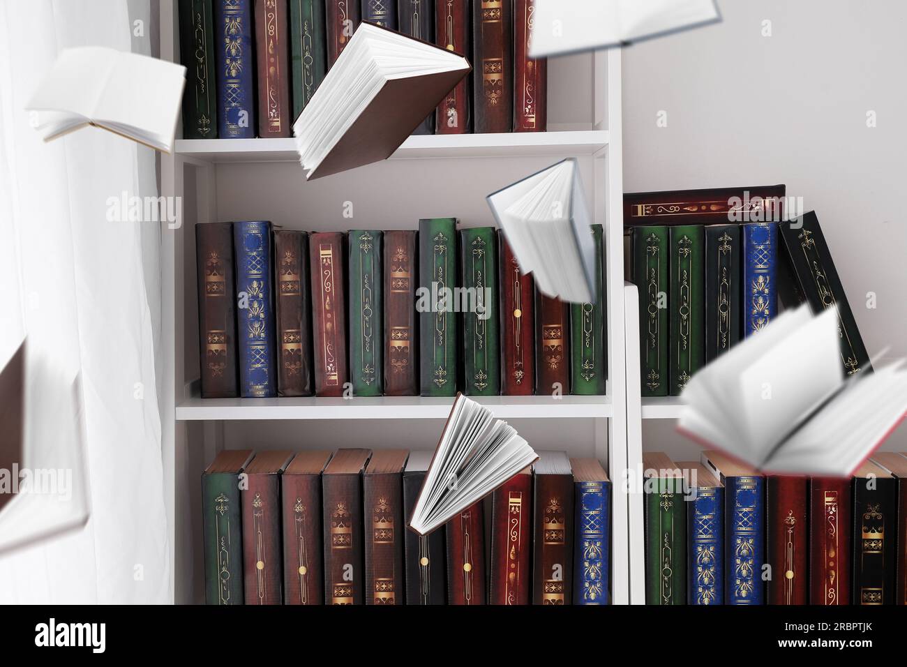 Flying books shelves hi-res stock photography and images - Alamy