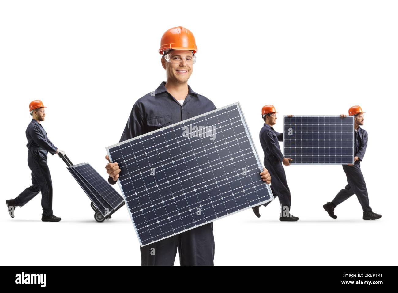 Factory worker posing with a solar panel and workers carrying panels in ...
