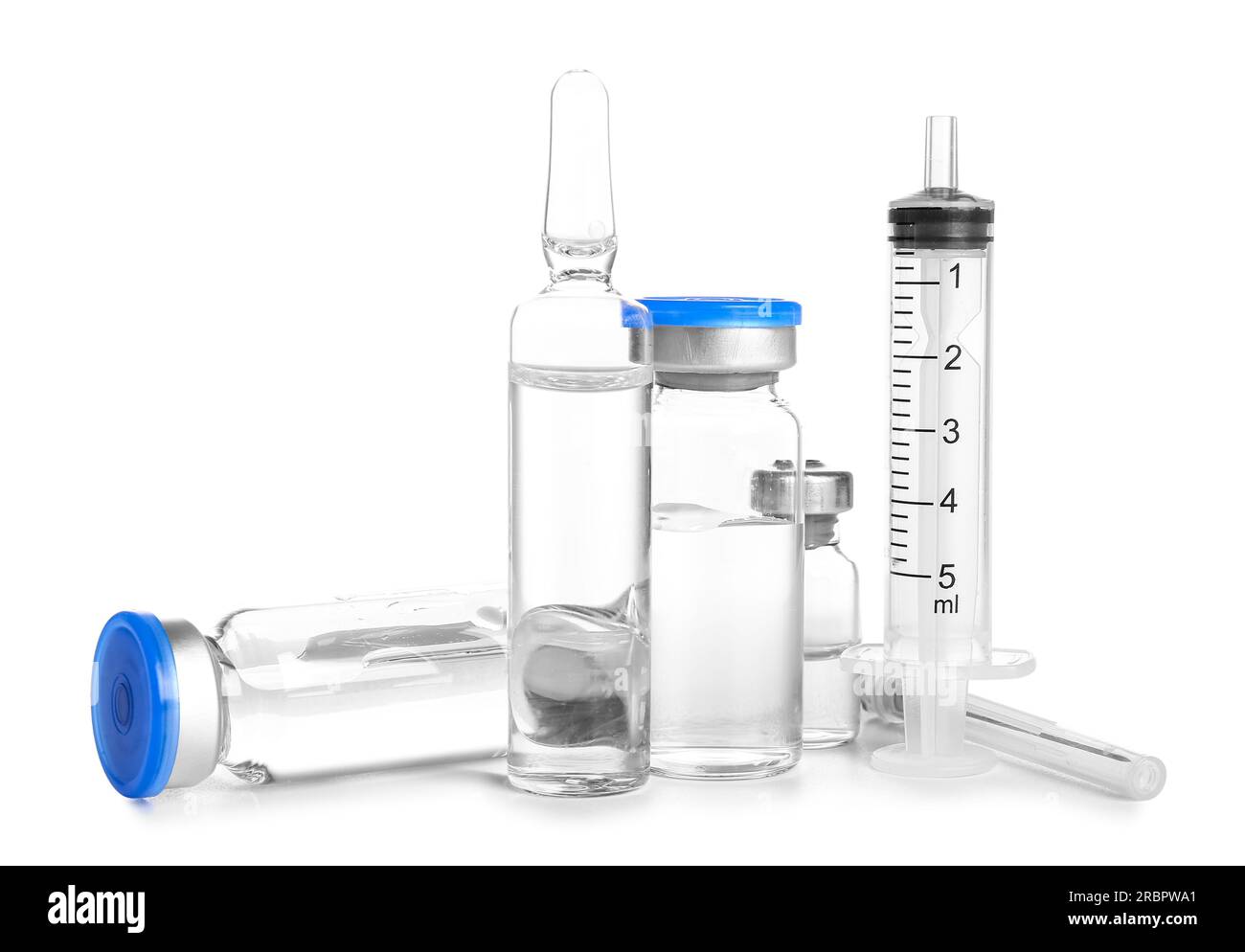 Medical ampules with syringe on white background Stock Photo - Alamy
