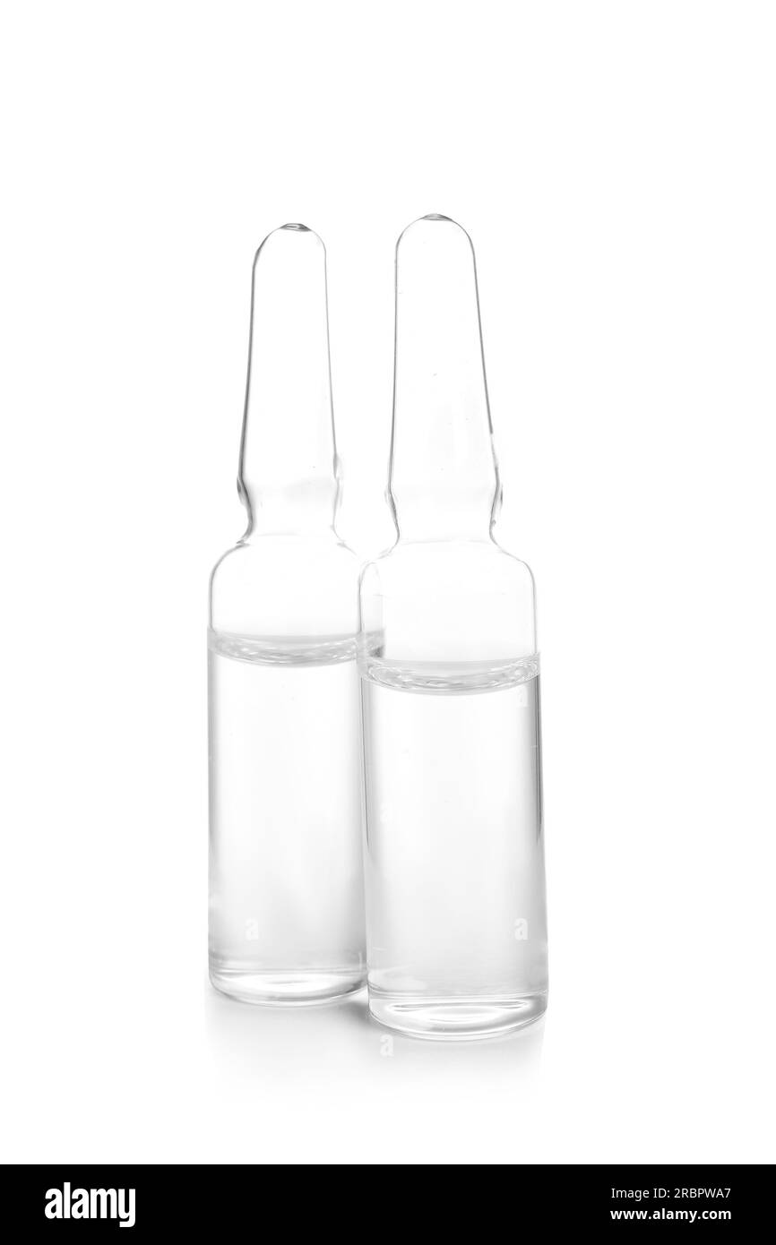 Medical ampules on white background Stock Photo - Alamy