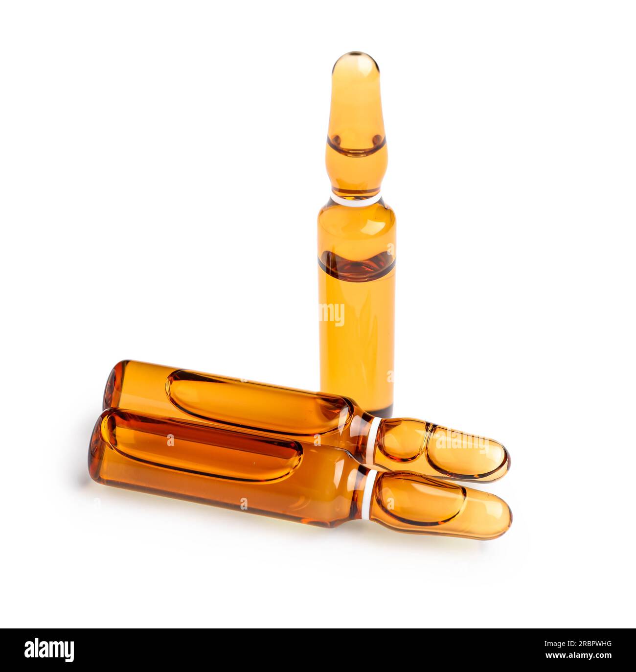Glass ampules on white background Stock Photo - Alamy