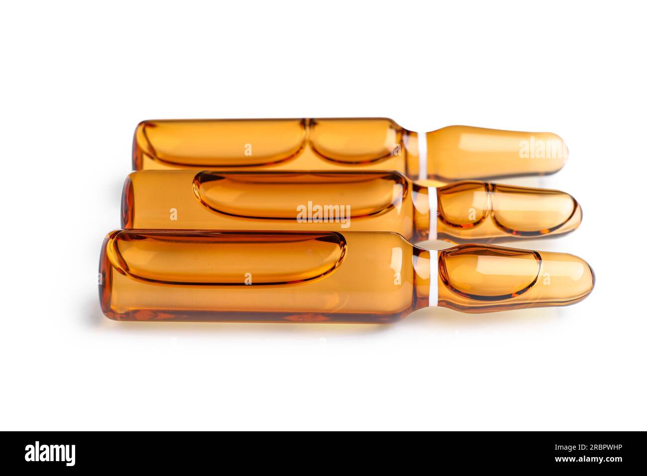 Glass ampules on white background Stock Photo - Alamy
