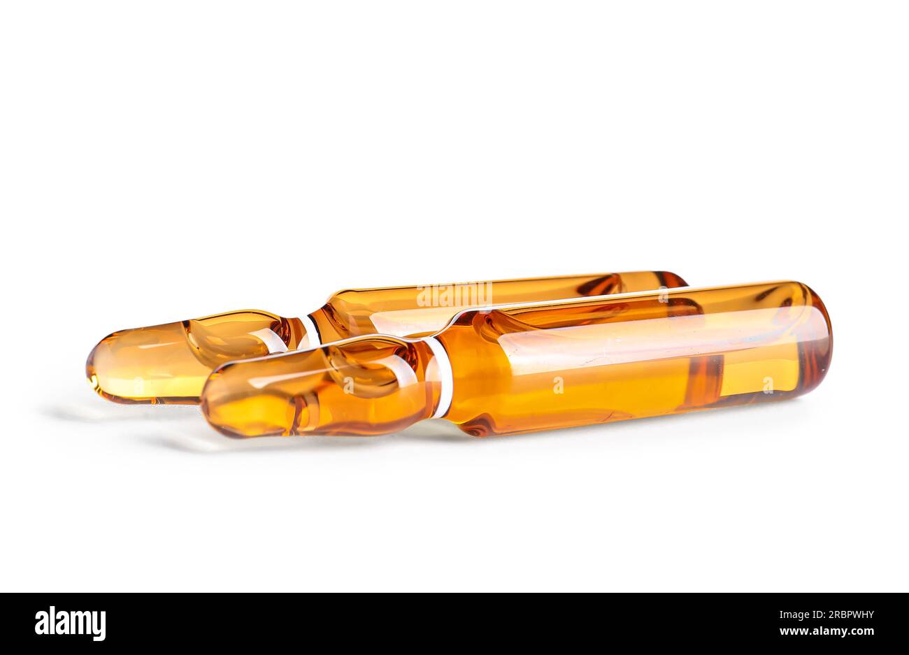 Glass ampules on white background Stock Photo - Alamy